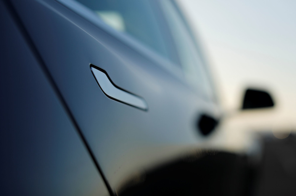 China is pulling the plug on yoke steering wheels and hidden door ...